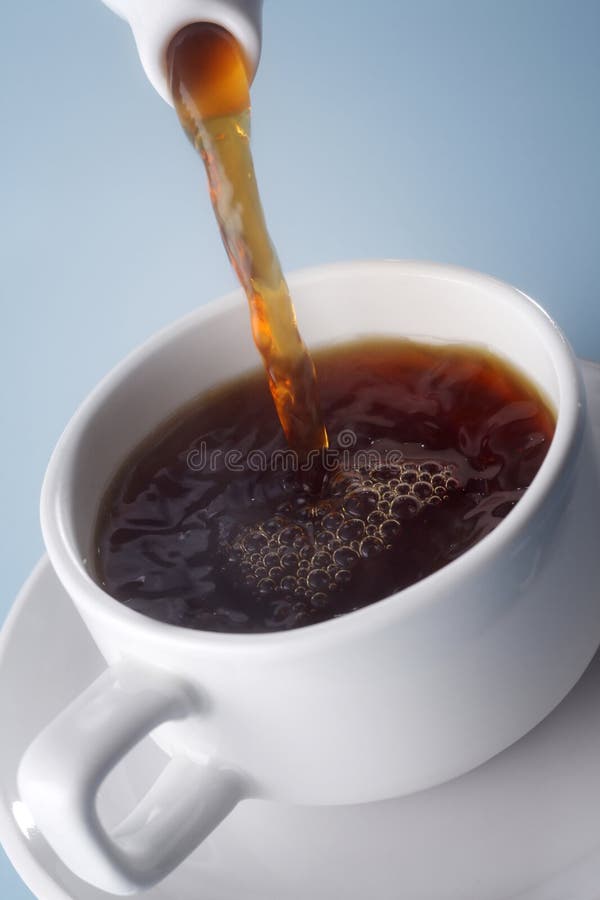 Teapot Pouring Tea into a Cup Stock Photo - Image of decoction, aroma ...