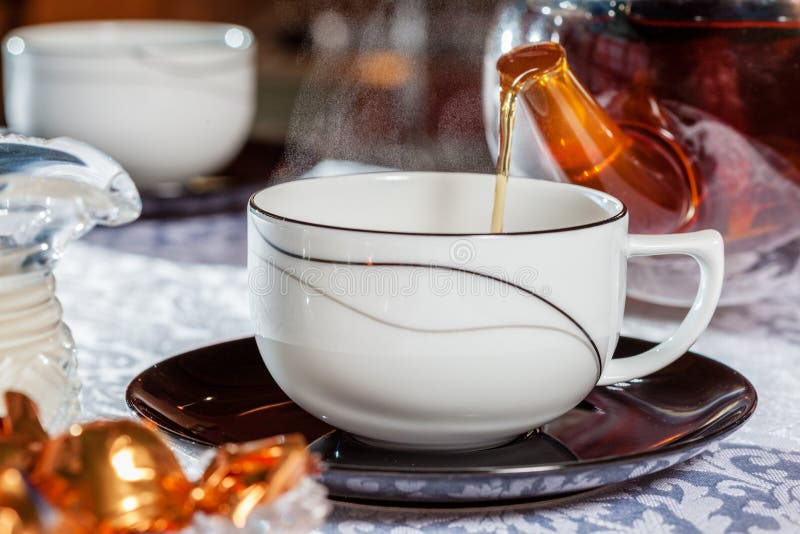 Pouring tea stock photo. Image of stream, setting, breakfast - 42087652