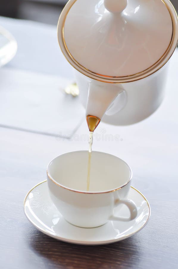 Pouring Tea , Tea Cup and Tea Pot or Hot Tea Stock Photo - Image of ...