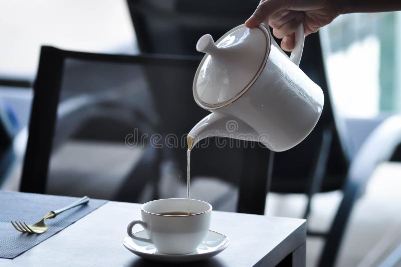 Pouring Tea , Tea Cup and Tea Pot or Hot Tea Stock Photo - Image of ...