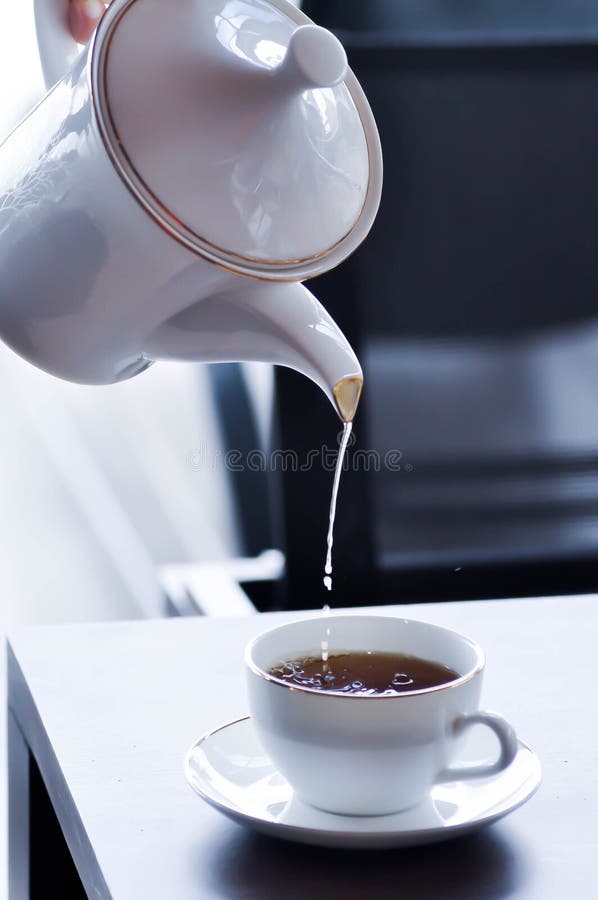 Pouring Tea , Tea Cup and Tea Pot or Hot Tea Stock Image - Image of ...