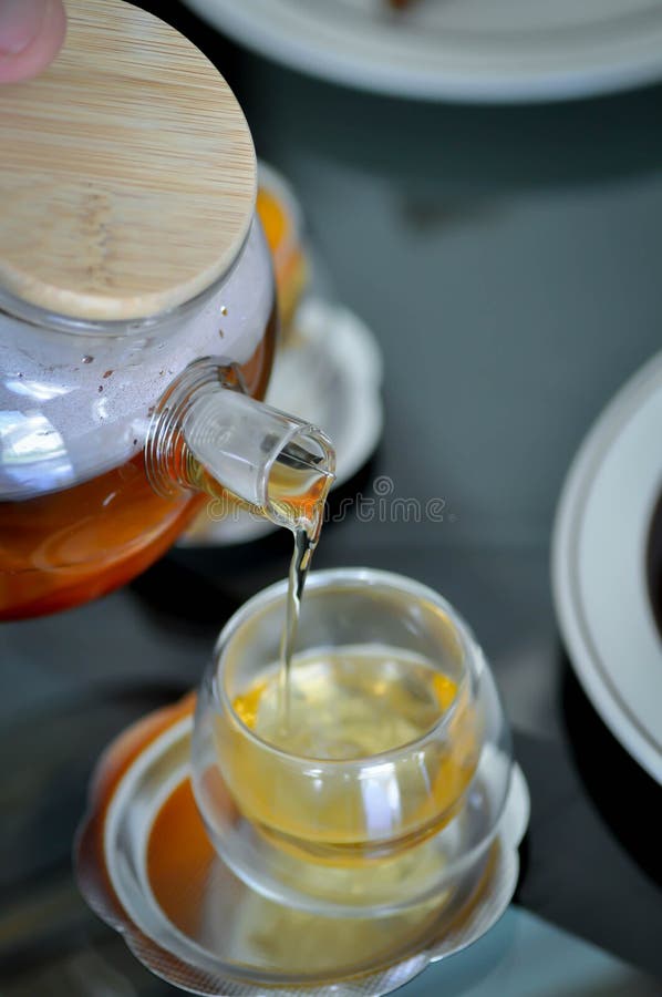 Pouring Tea , Tea Cup and Tea Pot Stock Image - Image of glass, drink ...