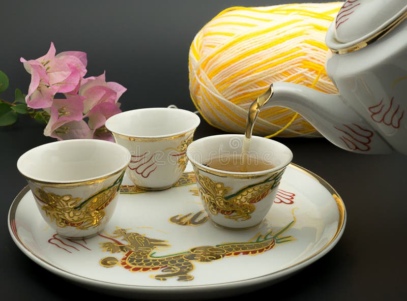 Pouring tea stock image. Image of teapot, brown, food - 69042747