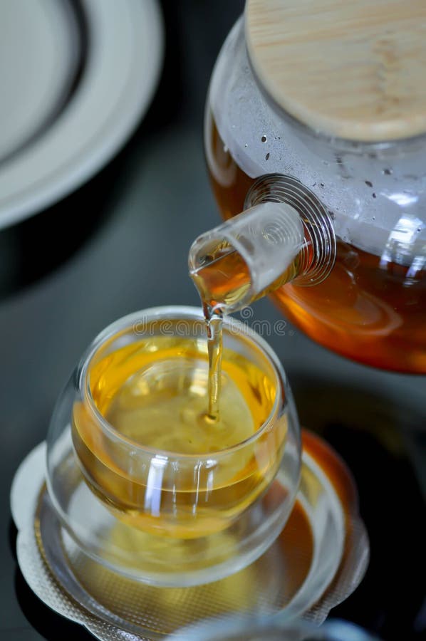 Pouring Tea , Tea Cup and Tea Pot Stock Image - Image of vapour ...