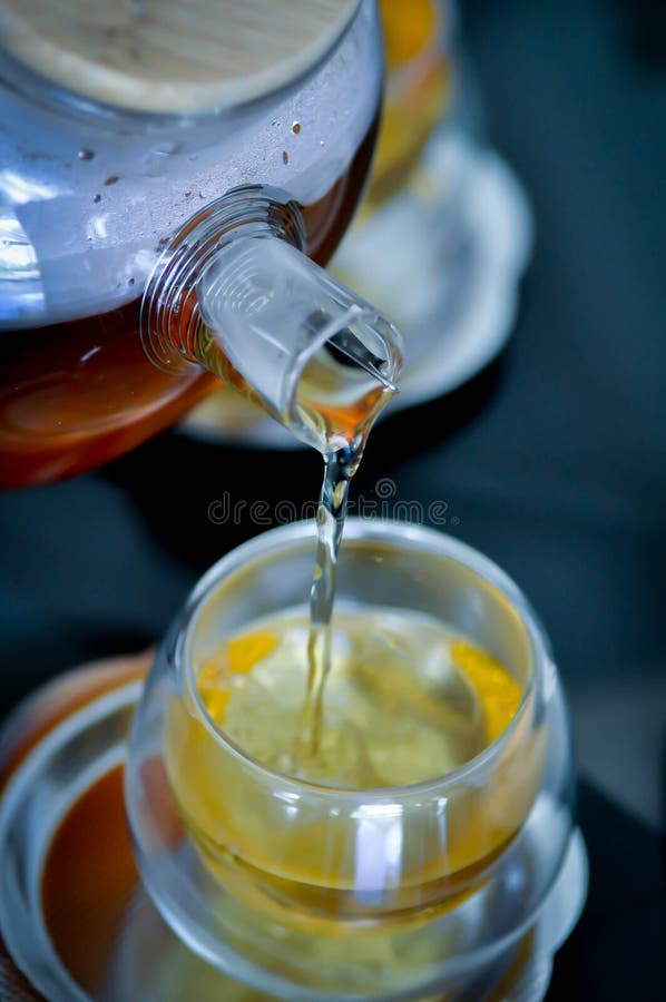 Pouring Tea , Tea Cup and Tea Pot Stock Image - Image of hand, water ...