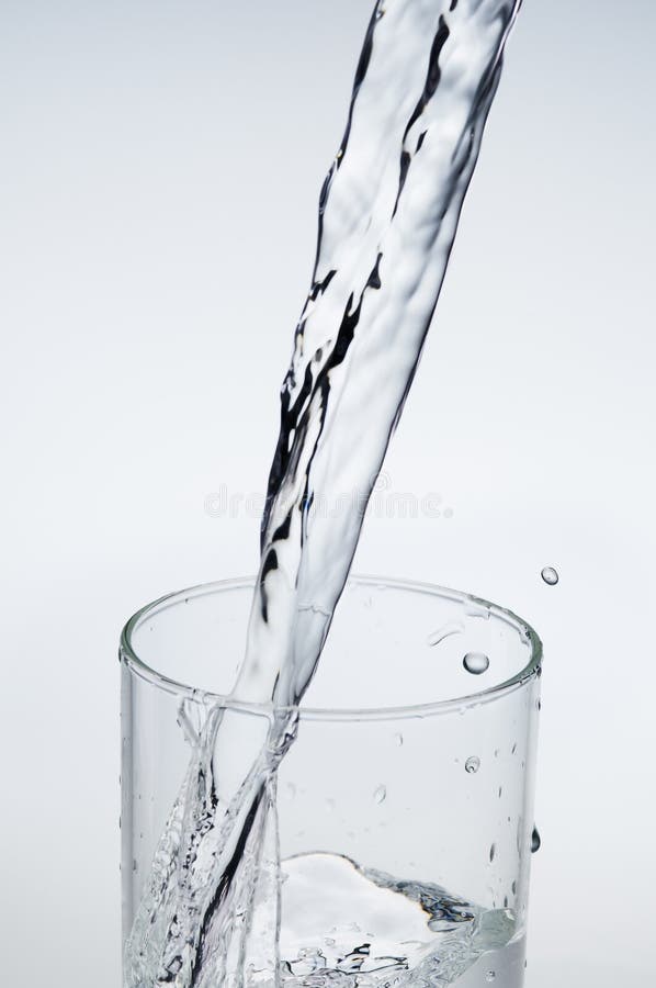 Pouring Mineral Water Stream into a Glass Stock Photo - Image of purity ...