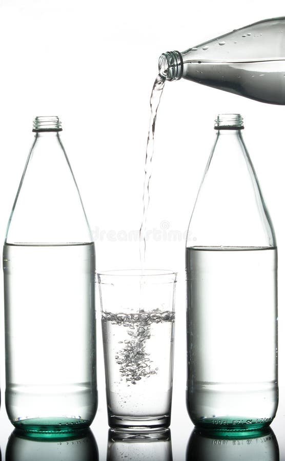 Pouring Water from a Bottle. Stock Photo - Image of stream, motion ...