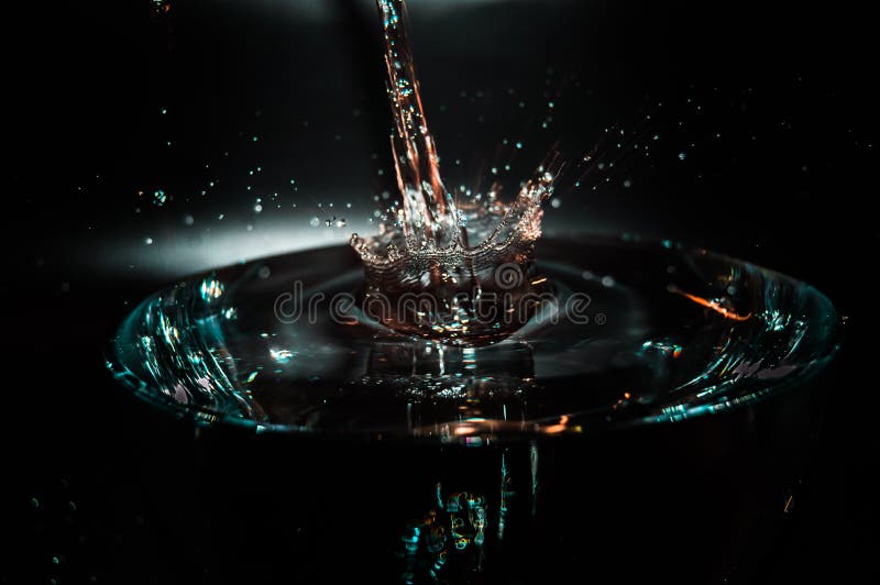 Pouring Water and Creating Perfect Splash Stock Photo - Image of slow ...