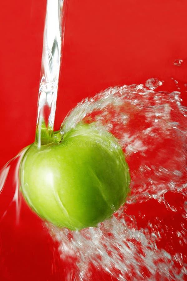 Pouring Water on Green Apple Stock Image - Image of fresh, nourishment ...