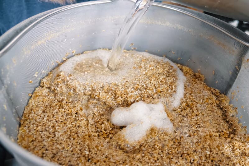 Pouring Water into Ground Barley Stock Photo - Image of organic ...