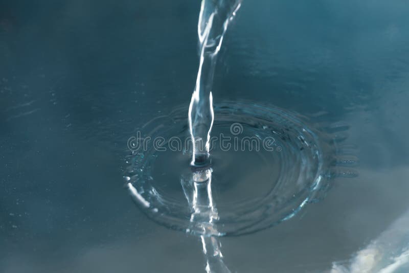 Pouring Water on Mirror Table. Fresh Drink Stock Photo - Image of water ...