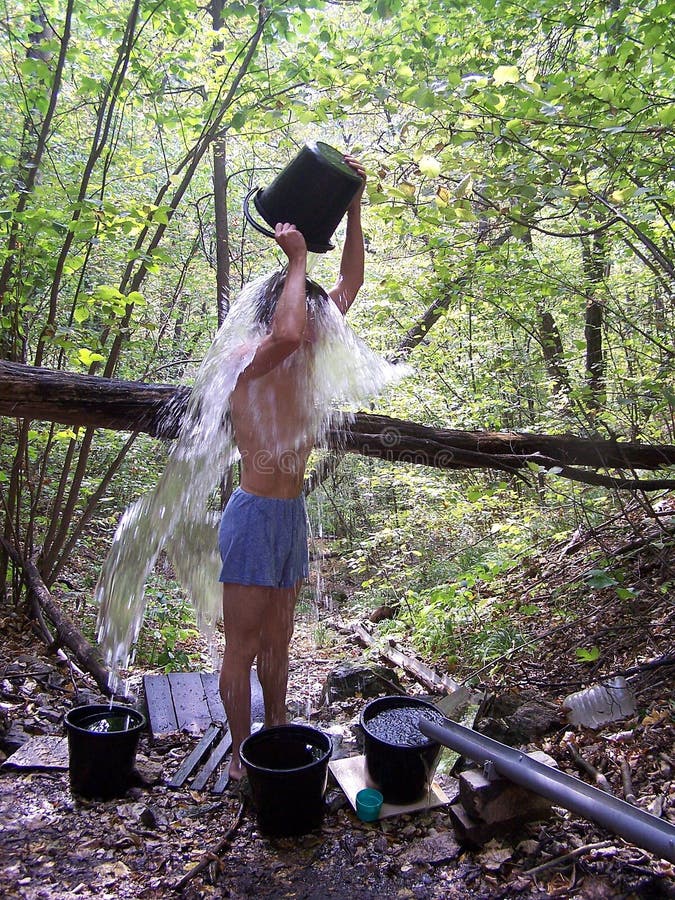 Pouring Water from the Source Stock Photo - Image of bucket, nature ...