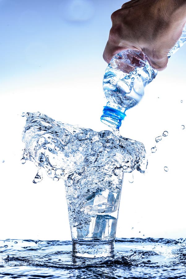 Pouring Water and Splashing in the Glass with Reflection on Mirror ...