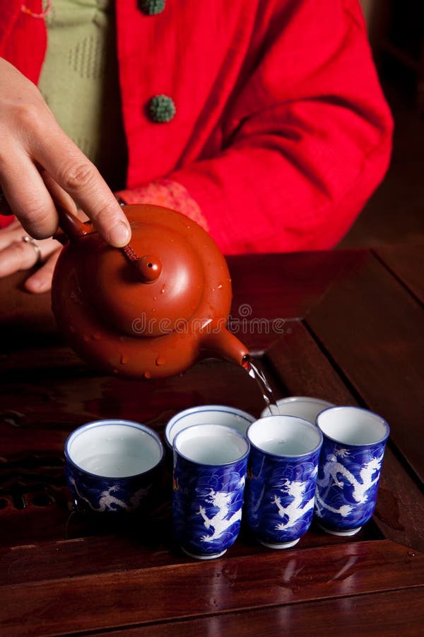 Pouring water for tea stock image. Image of teapot, porcelain - 12810931