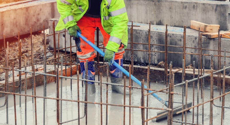 Pouring Wet Ready-mix Concrete into Lift Pit Base and Levelling it ...
