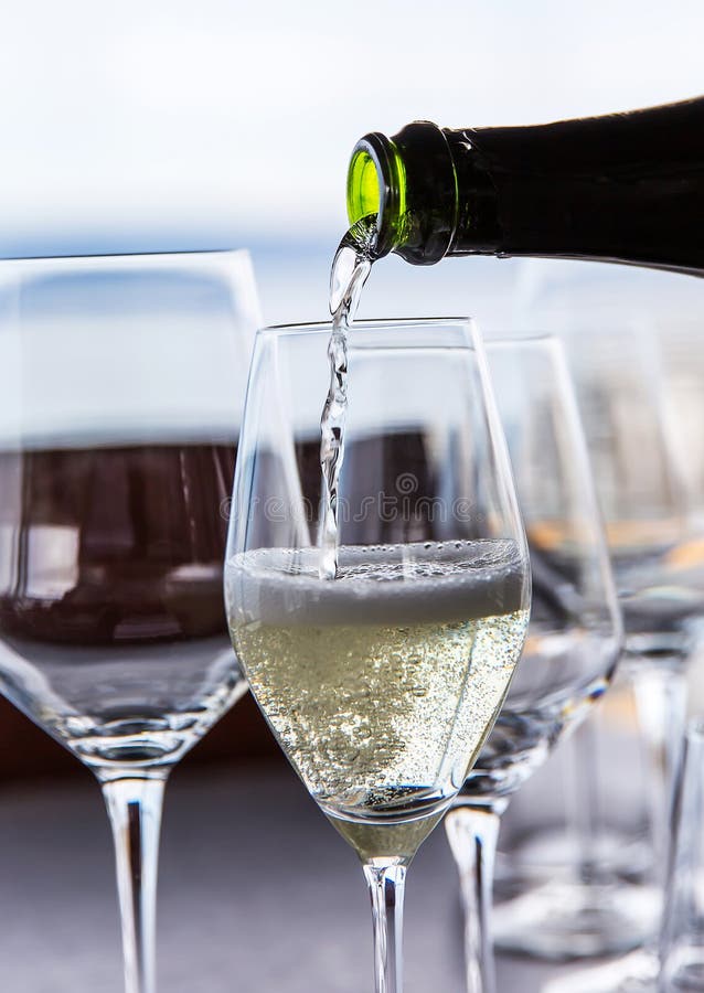 Pouring wine stock image. Image of beverage, booze, refreshment - 22000403