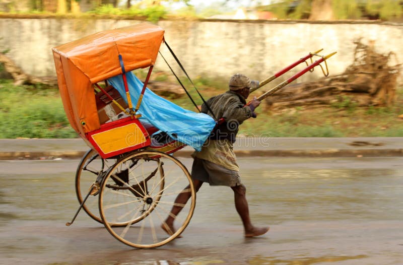 Pousse pousse in the rain editorial image. Image of indigenous - 23382240