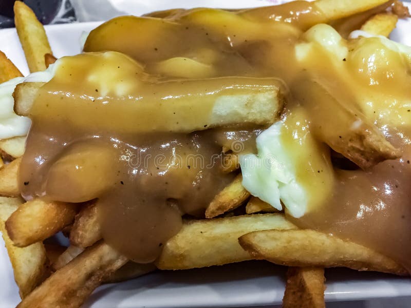 Repas de Poutine image stock. Image du fromage, calorie - 18601947