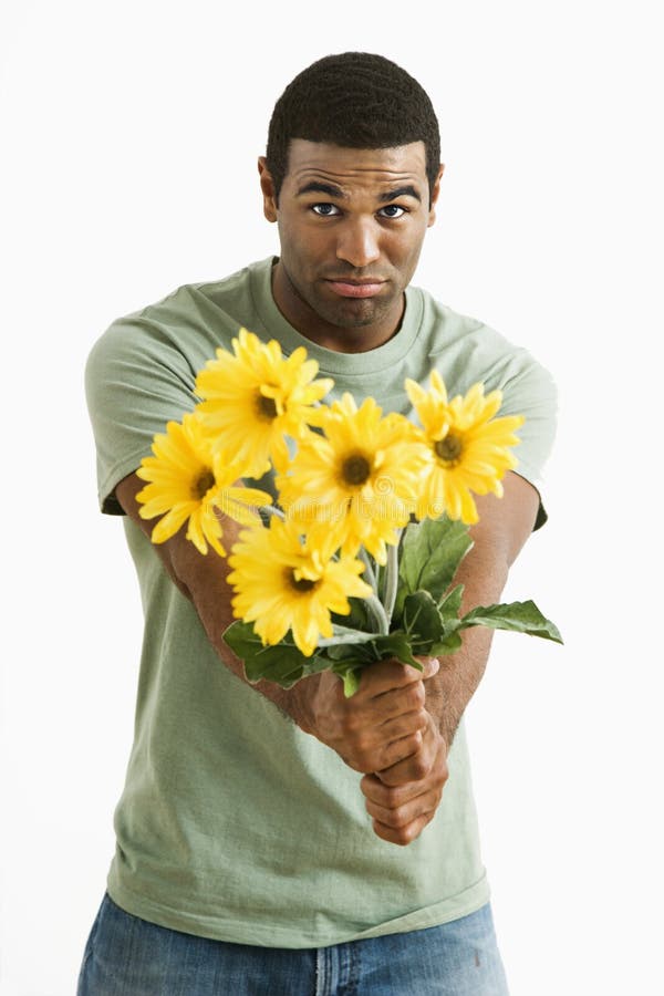 Pouting man with bouquet. stock image. Image of bouquet - 6152545