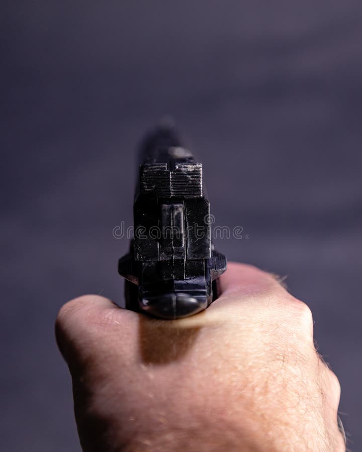 POV of hand aiming gun stock image. Image of metal, target - 135544117
