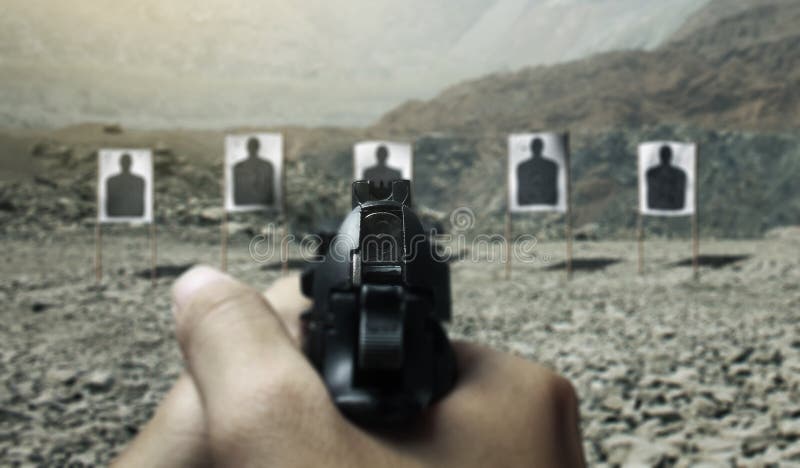 POV of Hand Aiming and Shooting Assault Rifle at Shooting Range Stock ...
