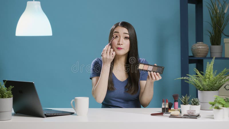 POV of Influencer Filming Makeup Tutorial with Eyeshadow Palette Stock ...