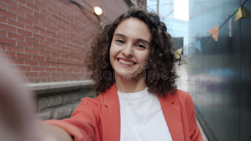 Pov Portrait Of Cute Girl Taking Selfie Outdoors Looking At Webcam Posing With Hand Gestures And