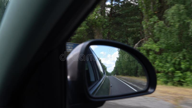 POV the Reflection in the Car Side Mirror of Road Stock Footage - Video ...