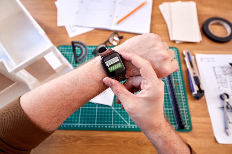 POV Shot of Male Architect Working in Office Using Smart Watch Stock ...