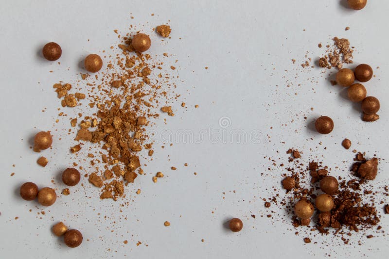 Powder or Blush of Bronze Color. Powder and Balls on a White Background ...