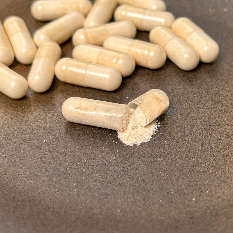 Powder Capsules on a Dark Background Stock Image - Image of shake, pill ...