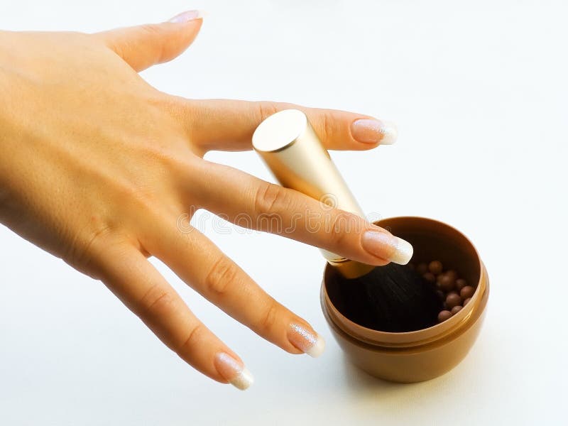 Powder and hand stock photo. Image of makeup, colours - 1317158