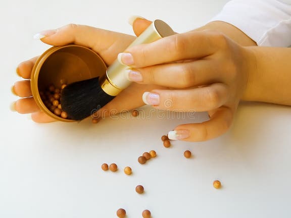 Powder and hand stock image. Image of blush, makeup, gold - 1317171