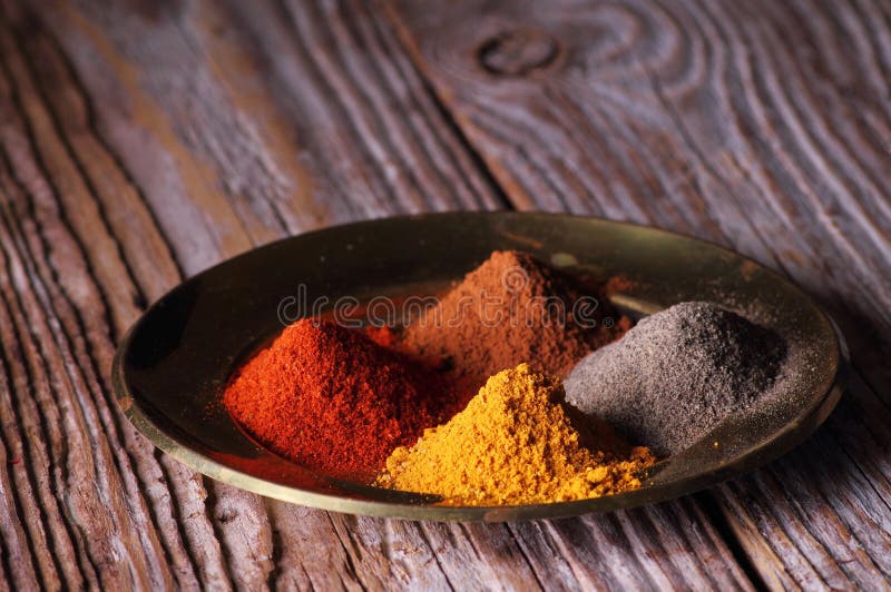 Powder spices on a plate stock photo. Image of fresh - 98696270