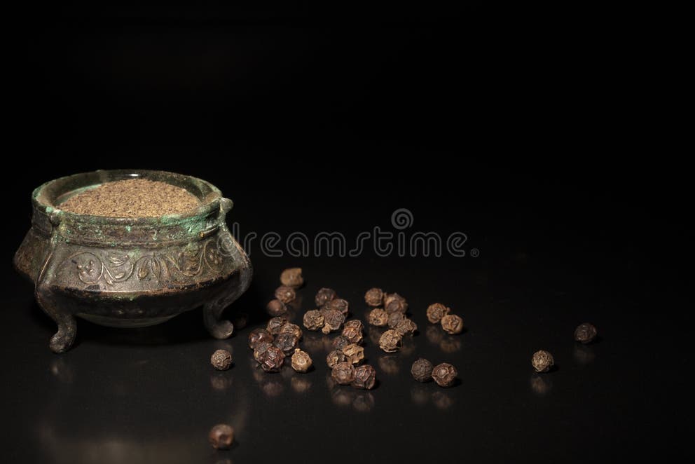 Powdered Black Pepper and Pepper Corns on Black Stock Photo - Image of ...