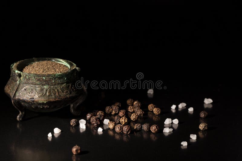 Powdered Black Pepper and Pepper Corns on Black Stock Image - Image of ...