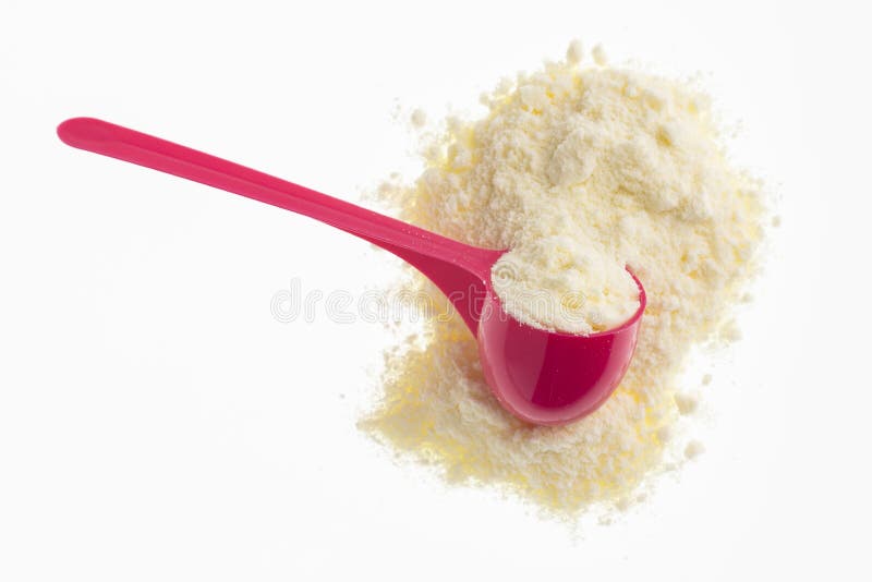 Powdered Milk with Nutrients in the Pink Spoon Stock Photo - Image of ...