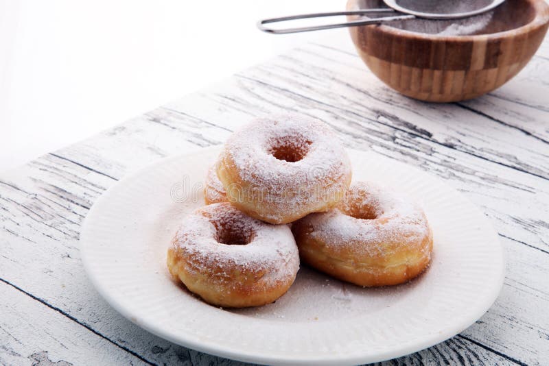 Powdered Sugar Donuts on Rustic White Table Stock Image - Image of cake ...