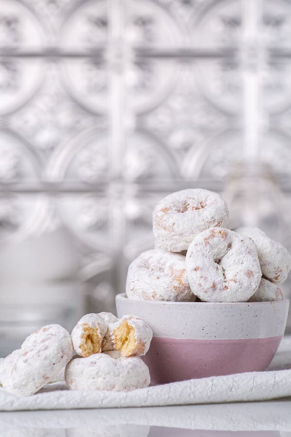 Powdered Sugar Mini Donuts in a Kitchen Stock Photo - Image of sugary ...