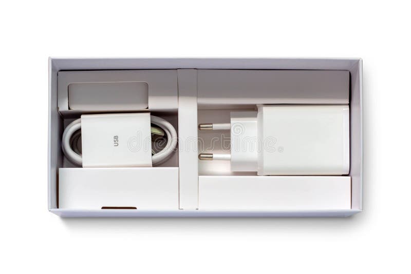 Power Adapter and USB Cable in the White Cardboard Box Isolated on ...