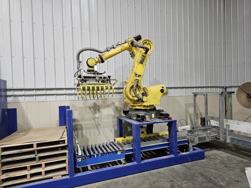 Power Arm for Atomization of Factory Work. Stock Image - Image of ...