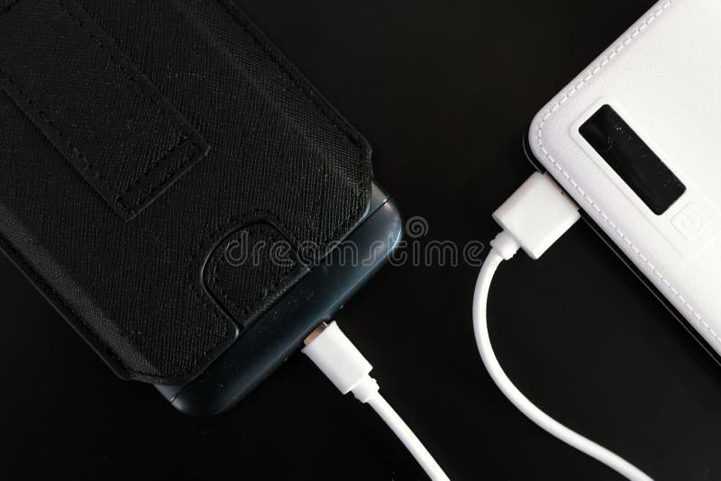 Power Bank or Battery Connected by Wire To Smartphone Stock Photo ...