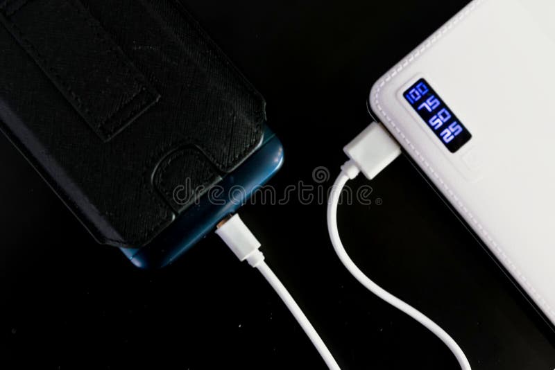 Power Bank or Battery Connected by Wire To Smartphone Stock Image ...