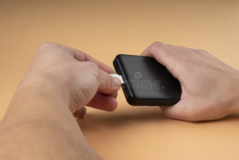 Power Bank Battery Portable Charger and Hand with USB Stock Image ...