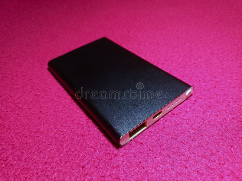 Power Bank for Charging Mobile Devices. Black Power Bank Stock Image ...