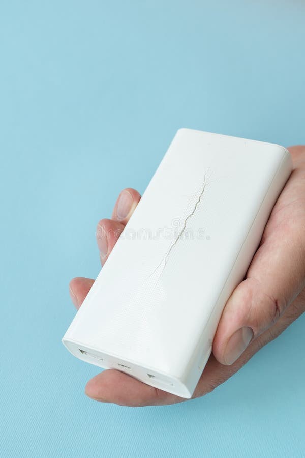 Power Bank in Hand, a Battery that Has Become Unusable, Expands and ...
