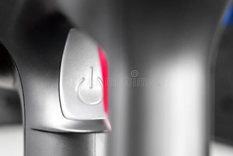 Power Button of a Vacuum Cleaner with Sleek Silver Design and Inviting ...