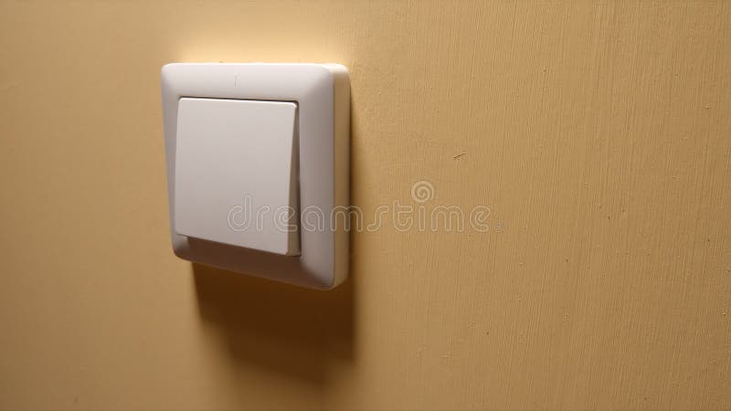 Power Button on a Yellow Wall - Side View Stock Image - Image of ...