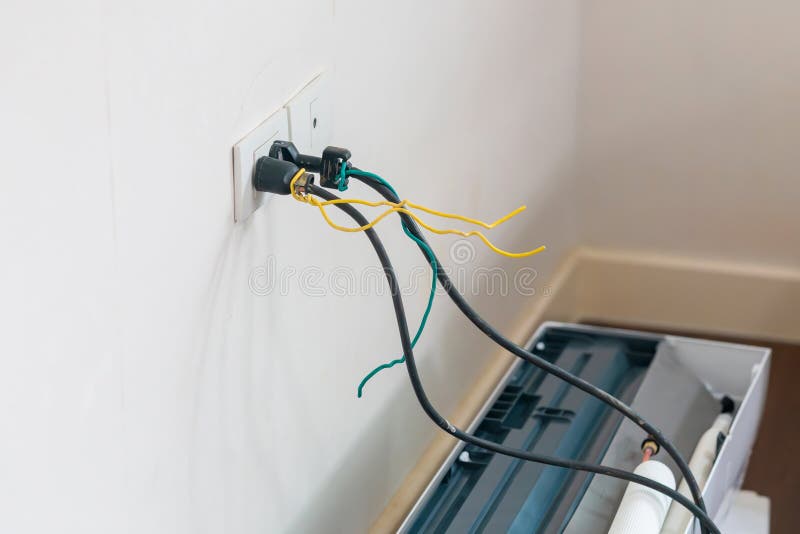 The Power Cable is Plugged into an Electrical Socket, Electrical Power ...