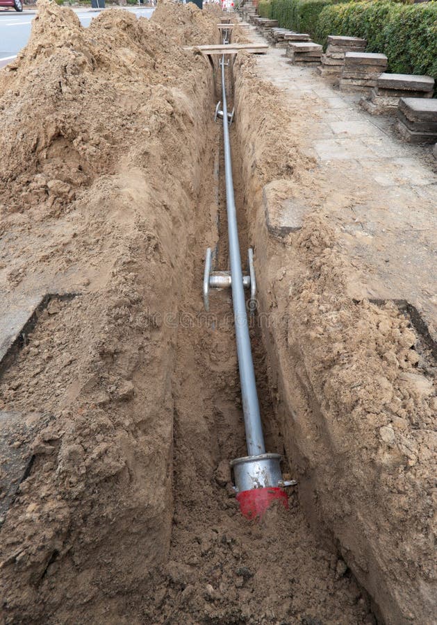 Power cables in the earth stock image. Image of works - 18520519